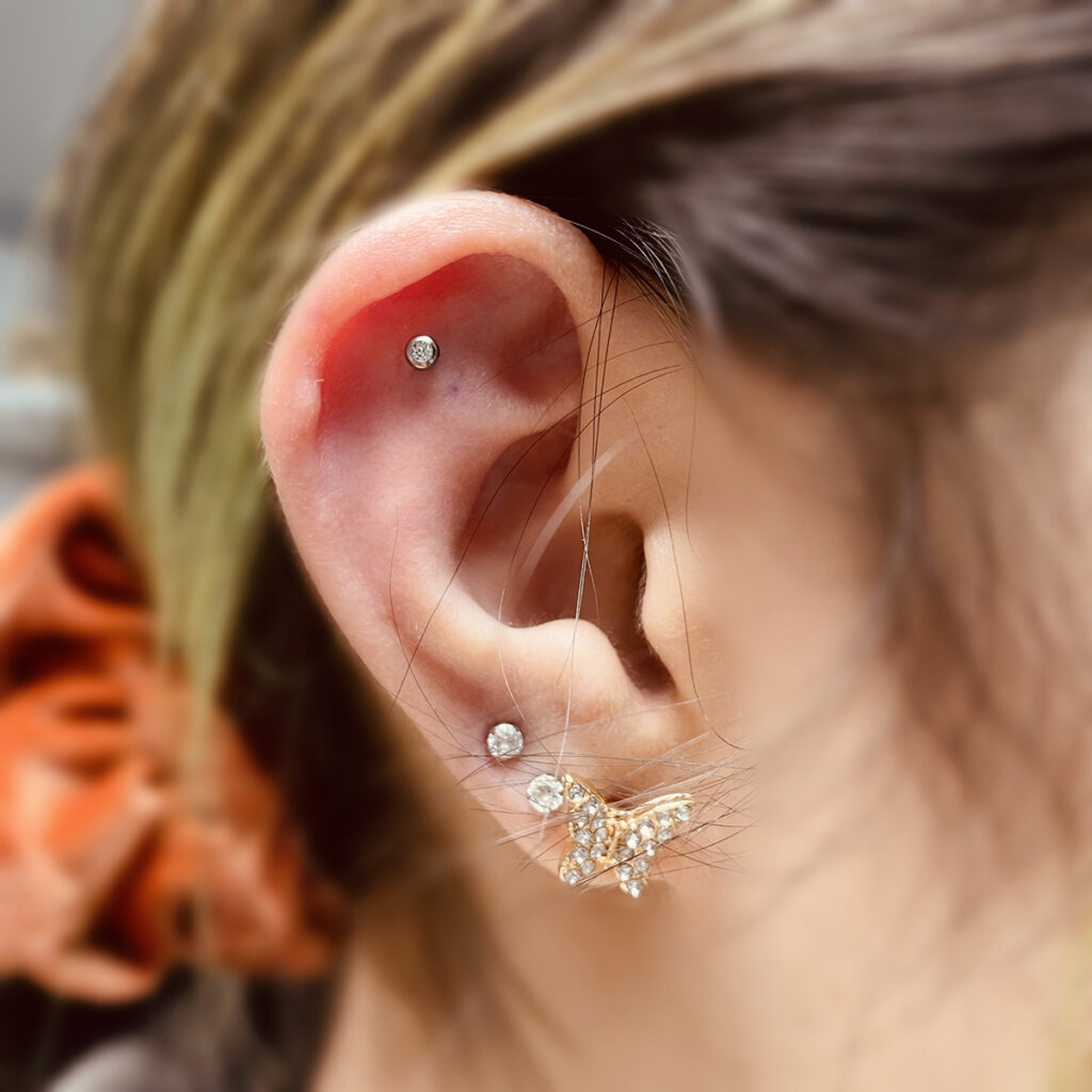 Stephanie – Screaming Needle Tattoo